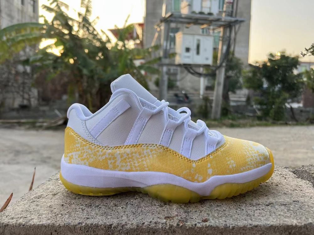 Jordan 11 Low Yellow Snakeskin