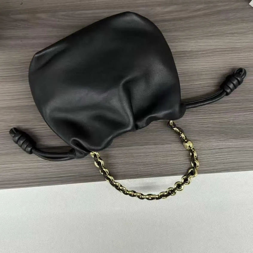 Designer bucket bag with drawstring closure, genuine leather shoulder ...
