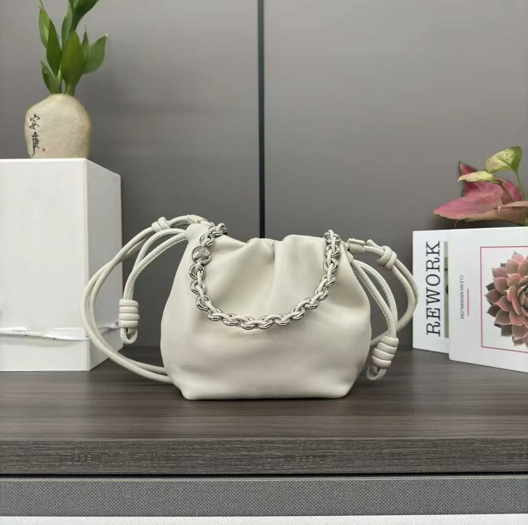 Designer bucket bag with drawstring closure, genuine leather shoulder ...