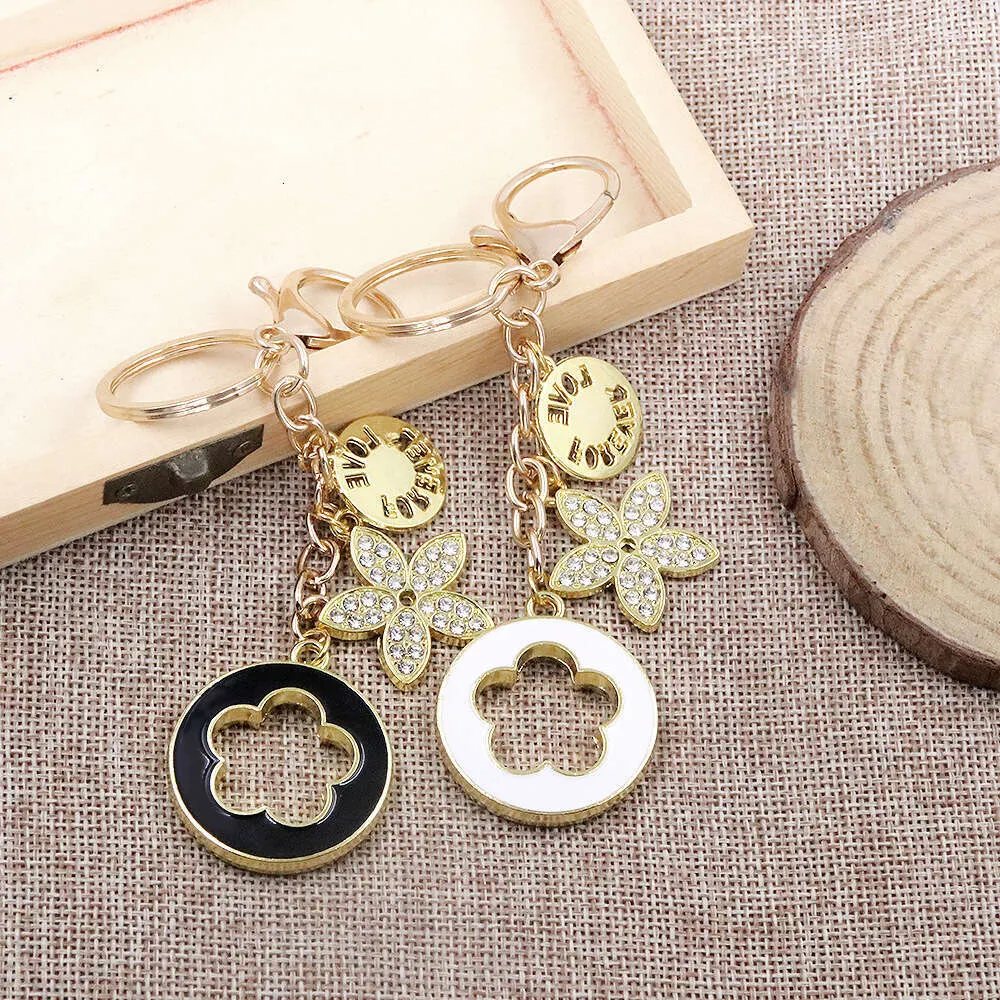 Crystal flower keychain with 14K gold plated copper double pendant for ...