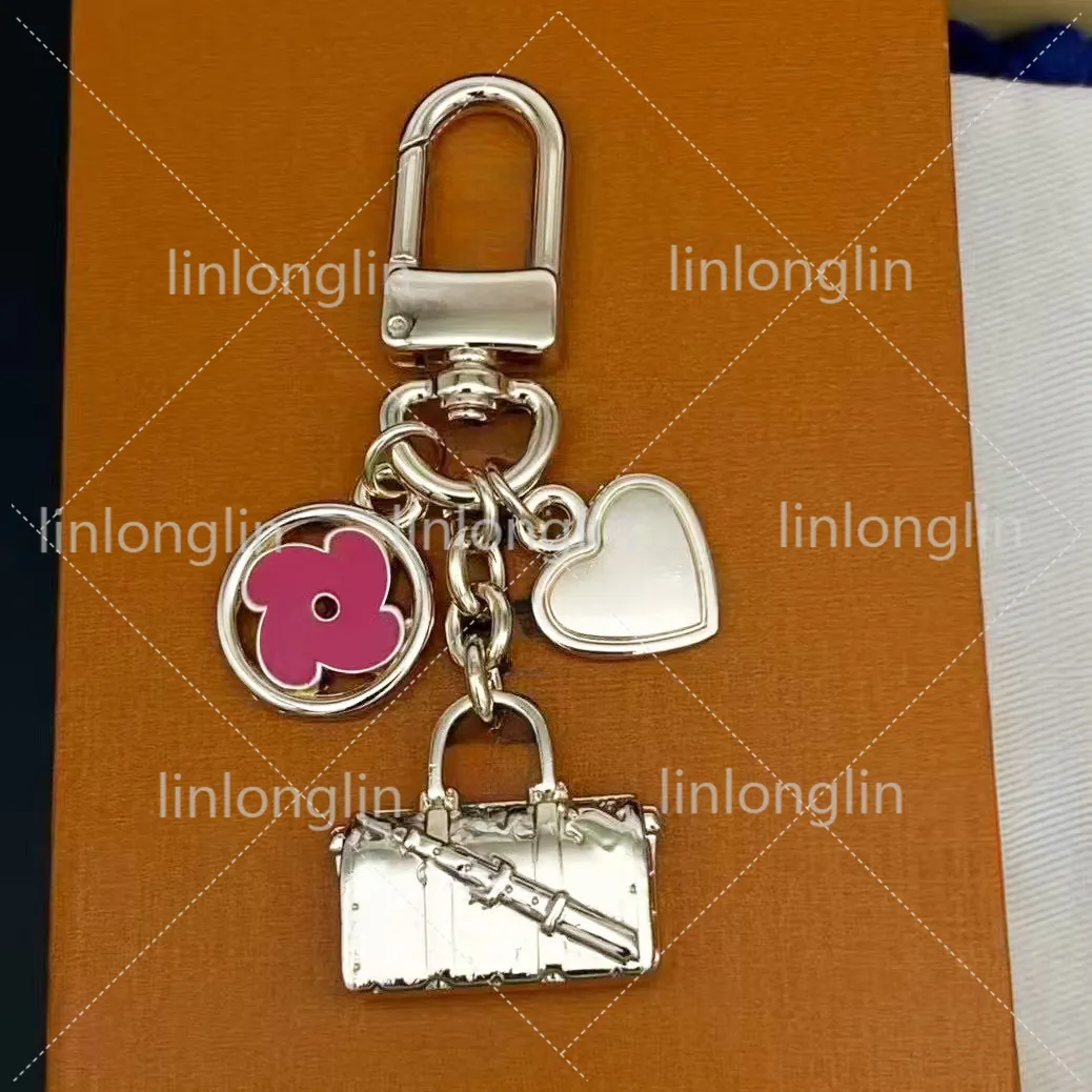 Charming Designer Gold Bag Hanging Keychain Charm With Heart Trinket ...