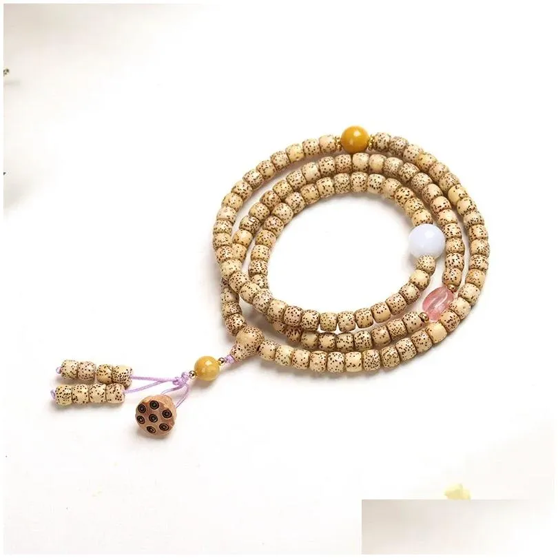 DHgate.com:Hainan Golden Seed Old Xingyue Bodhi 108 Bead DHgate.com:Hainan Golden Seed Old Xingyue Bodhi 108 Bead