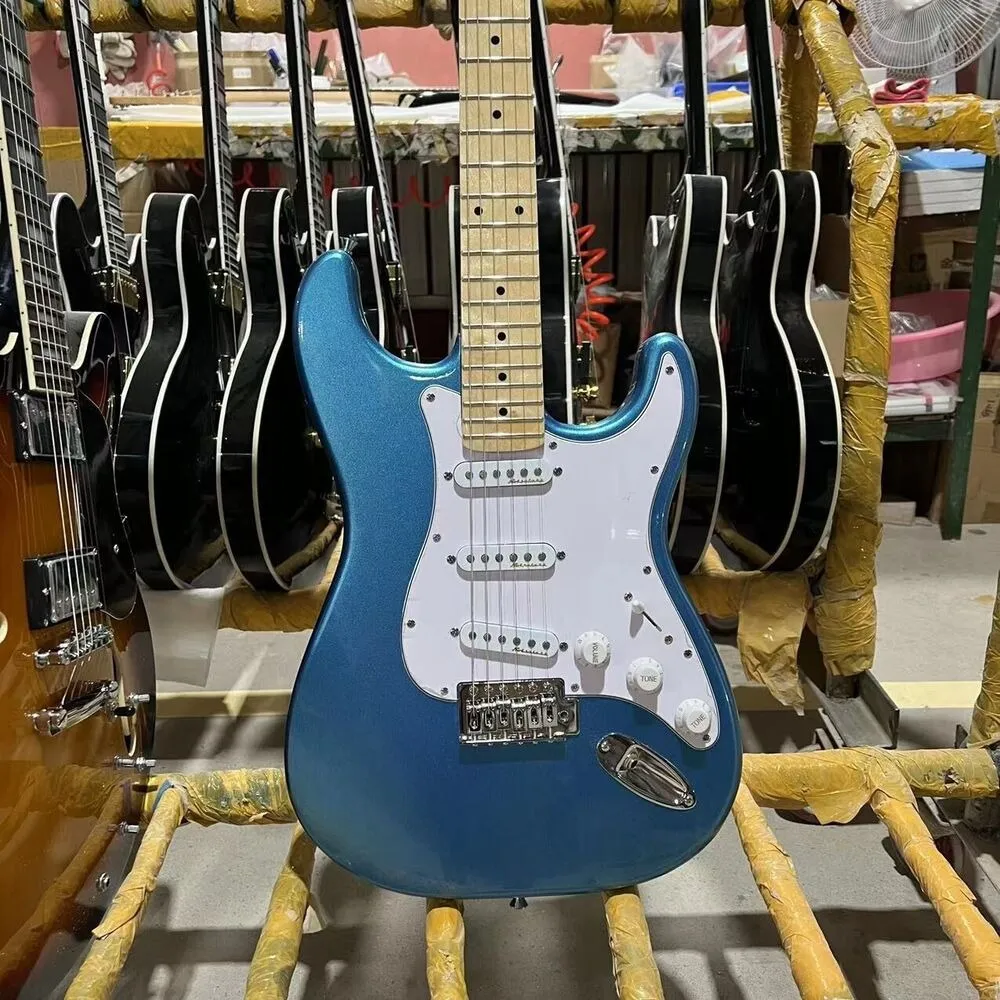 Blue Electric Guitar With Maple Fretboard, Mahogany Body, And Metallic ...