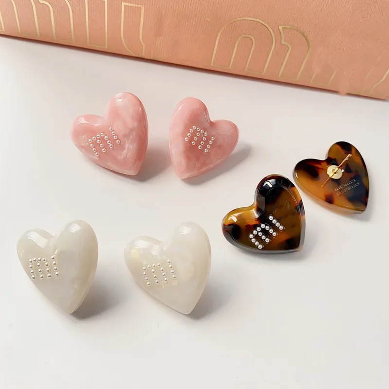Tortoiseshell heart earrings store