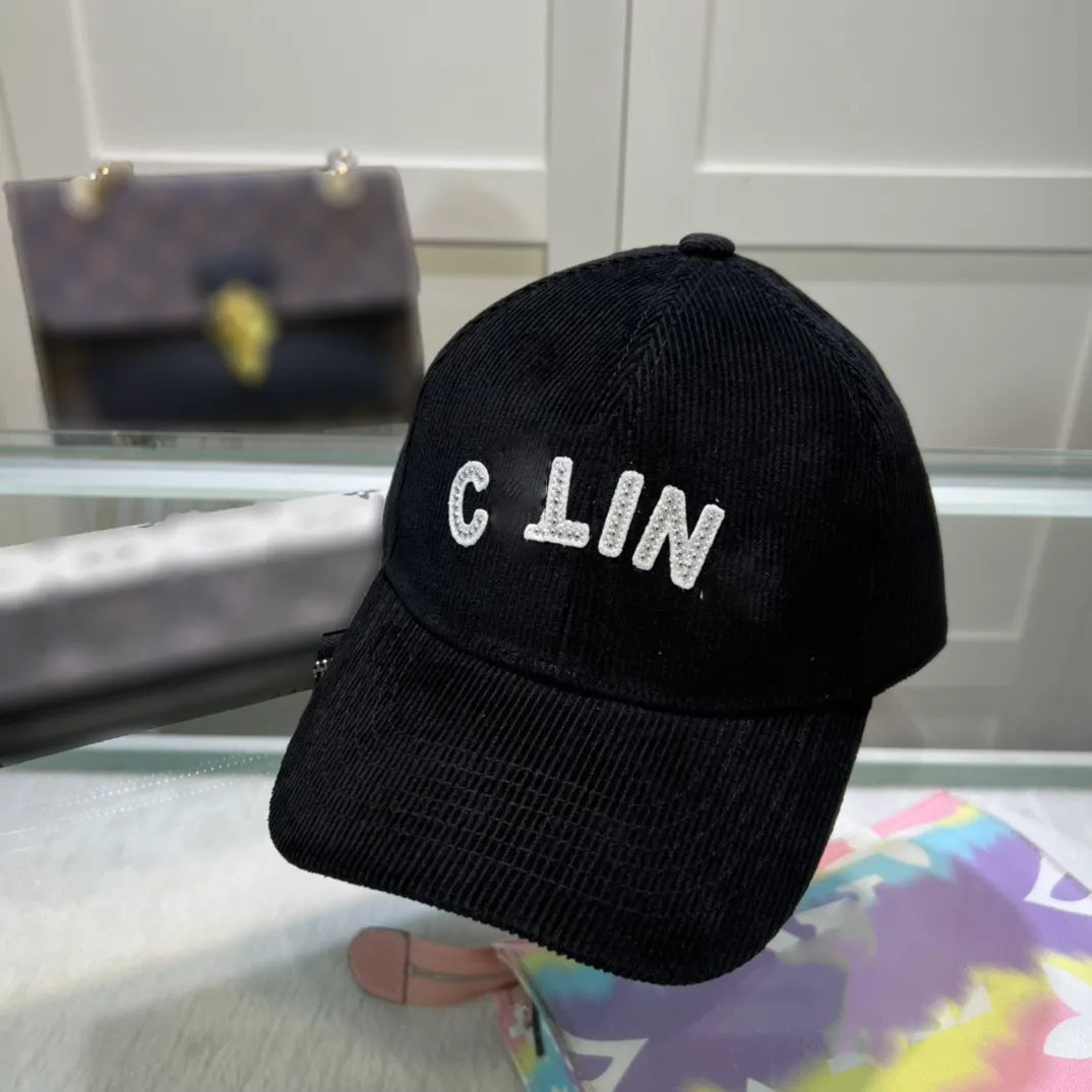 Designer unisex cotton baseball cap with embroidered letters and ...