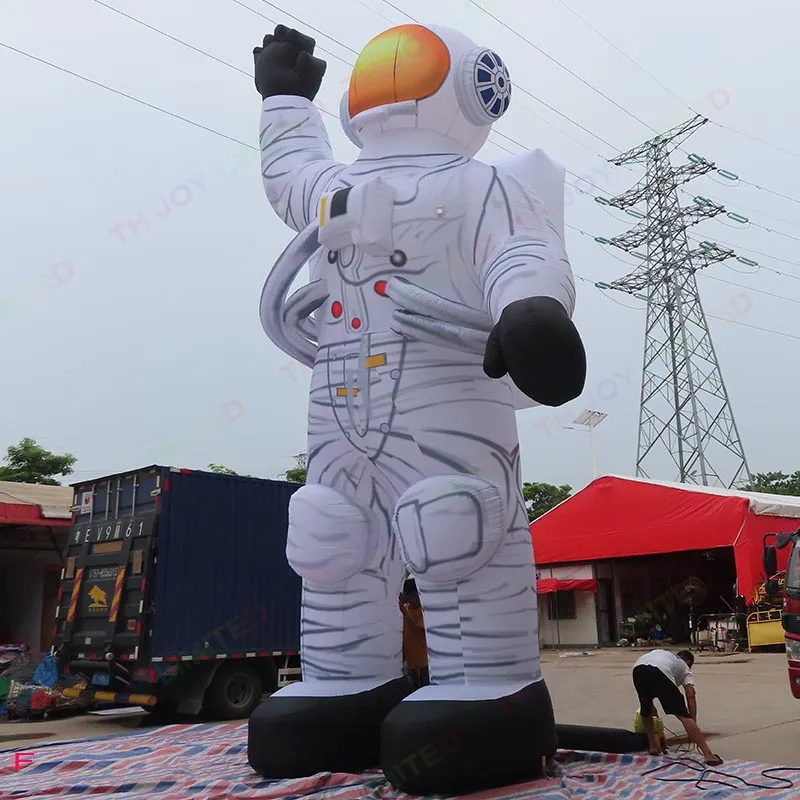 Inflatable Alien Model: Orange Astronaut Inflatable Spaceman Cartoon ...