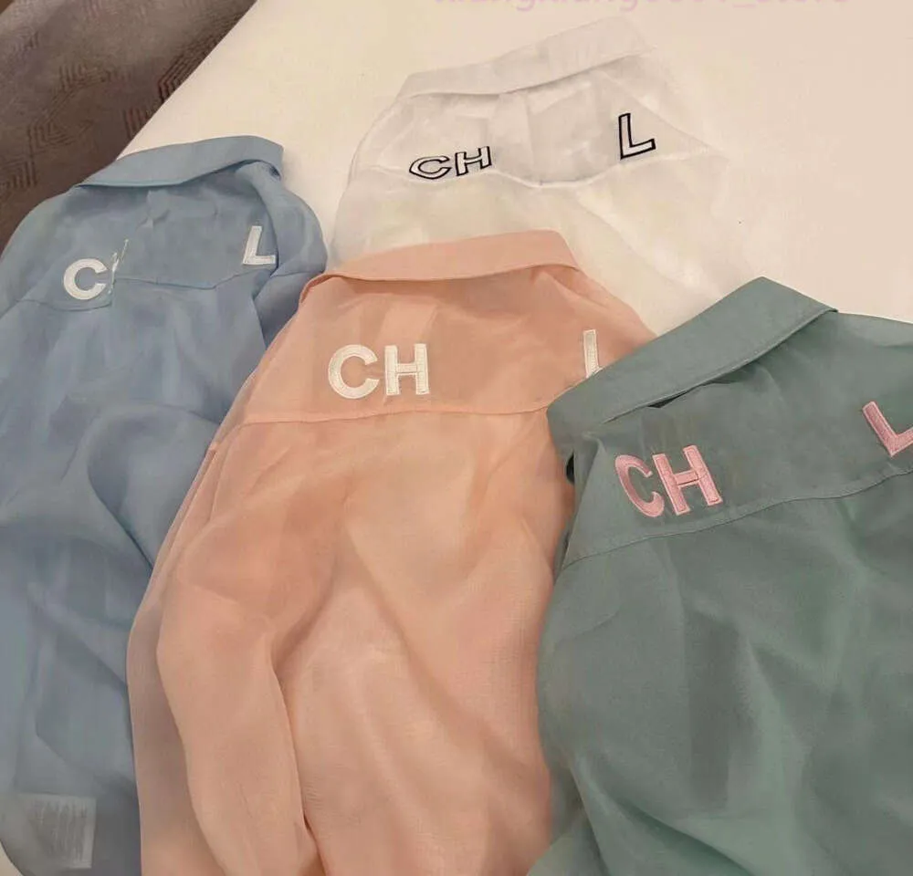 DHgate.com:French Elegance: Sheer Summer Blouses for Sun Protection:Apparel