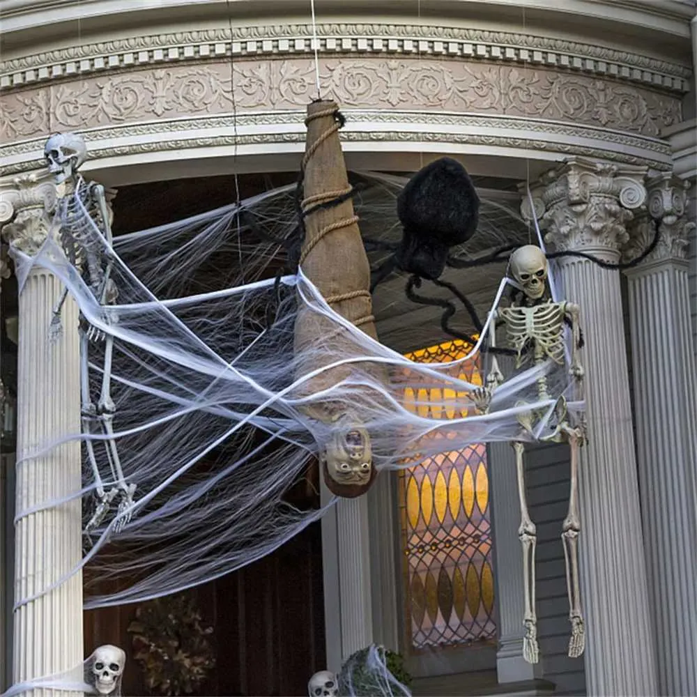 Glowing Halloween Spider Web Decor - White Stretchy Cobweb for Indoor ...