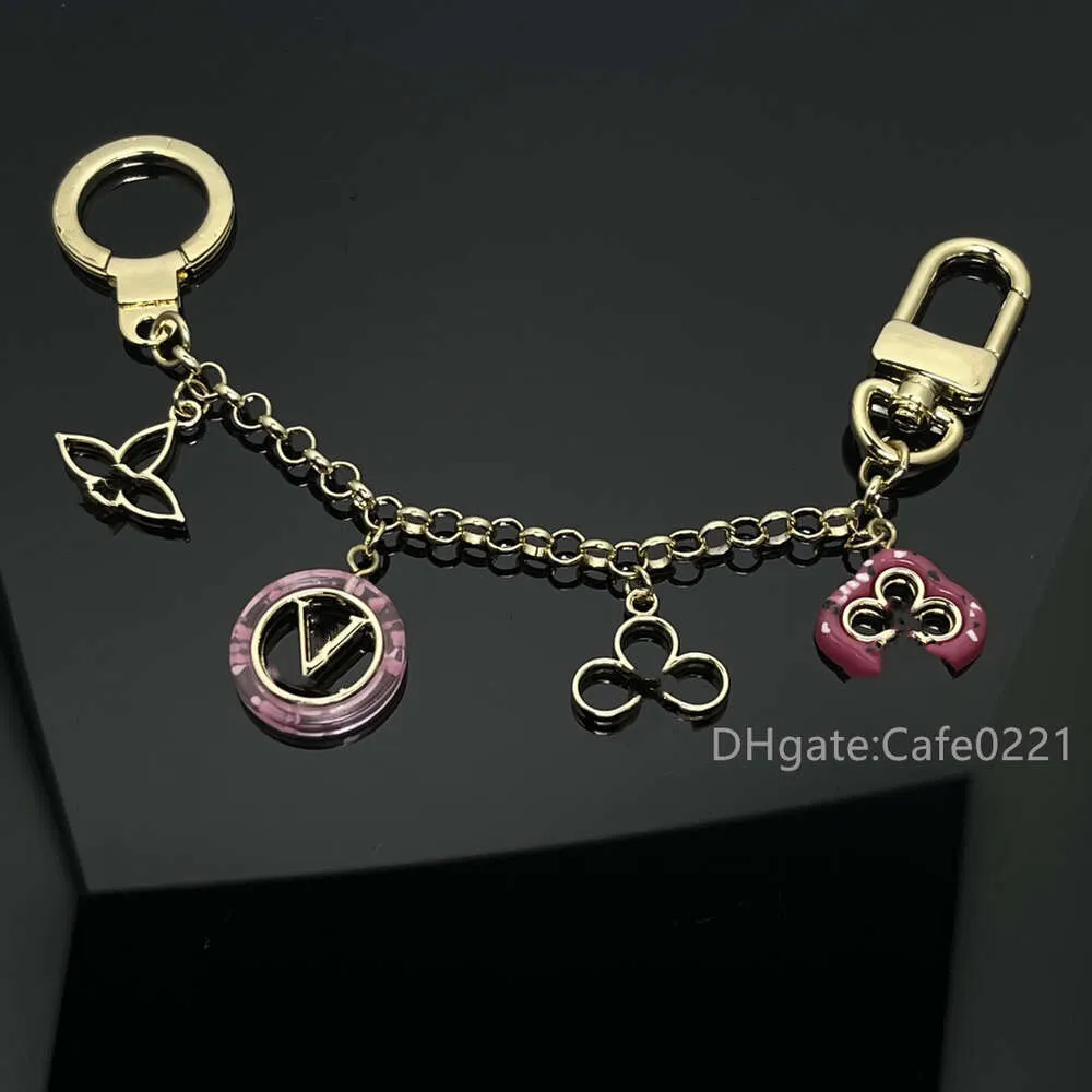 Designer Women Bag Chain Key Chain Fashion Gold Plated Trendy Bracelet ...