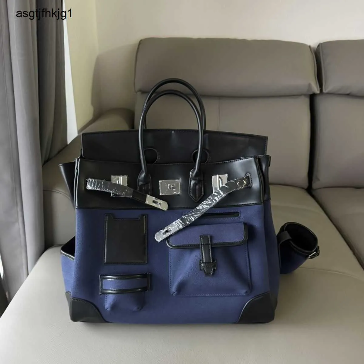 DHgate.com:Unisex Leather Travel Bag - Large 40cm Designer Handbag ...