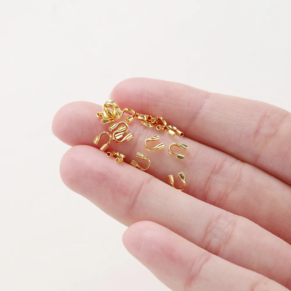 DHgate.com:50-200Pcs U-Shape Gold Plated Brass Wire Protectors | Ideal ...