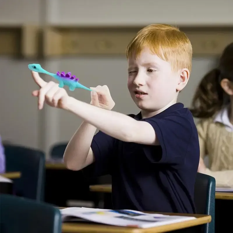 DHgate.com:30Pcs Soft Rubber Dinosaur Finger Toys for Stress Relief and ...