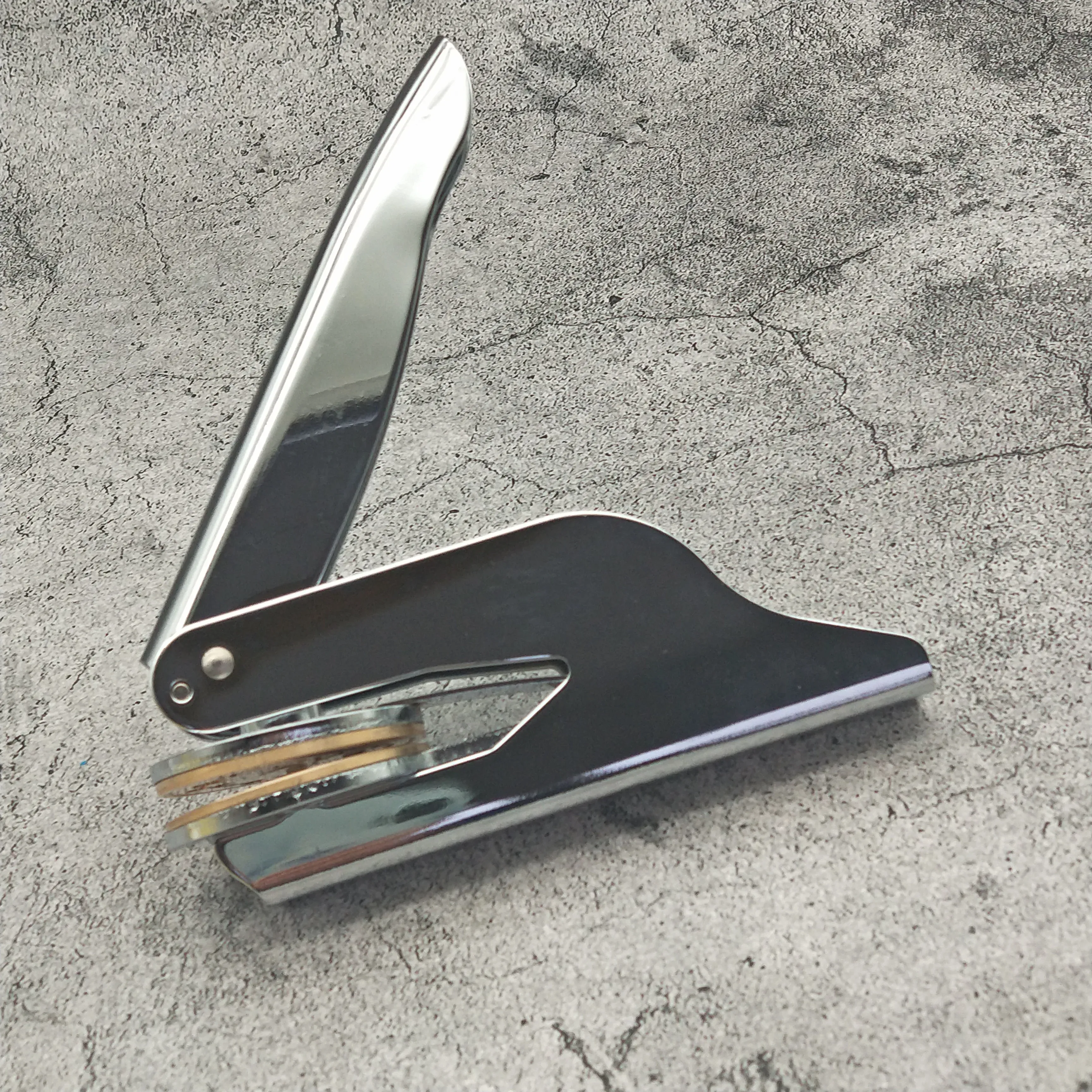 hand held embossing tool