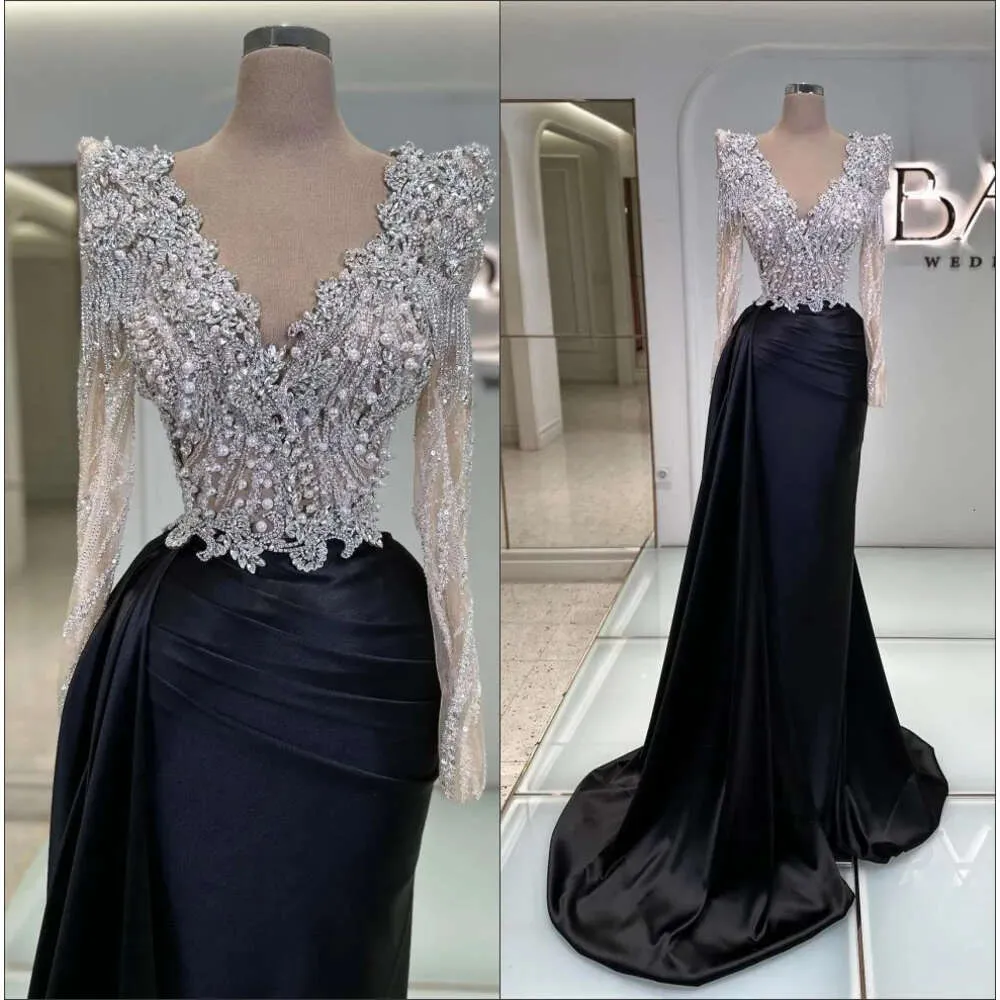 Stunning Black Mermaid Evening Sheer V Neck Stones Beading Long Sleeves Prom Dress Ruffles ...