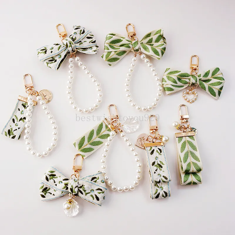 Braided Strap Keychain with Leaf Shape and Heart Bow Pendant, 14K Gold ...