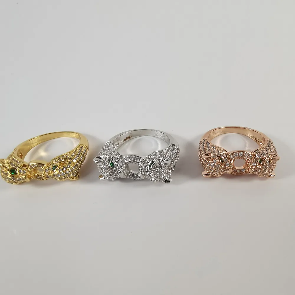 Statement Ring: 18K Gold Plated Double Leopard Head with Emerald Accent ...