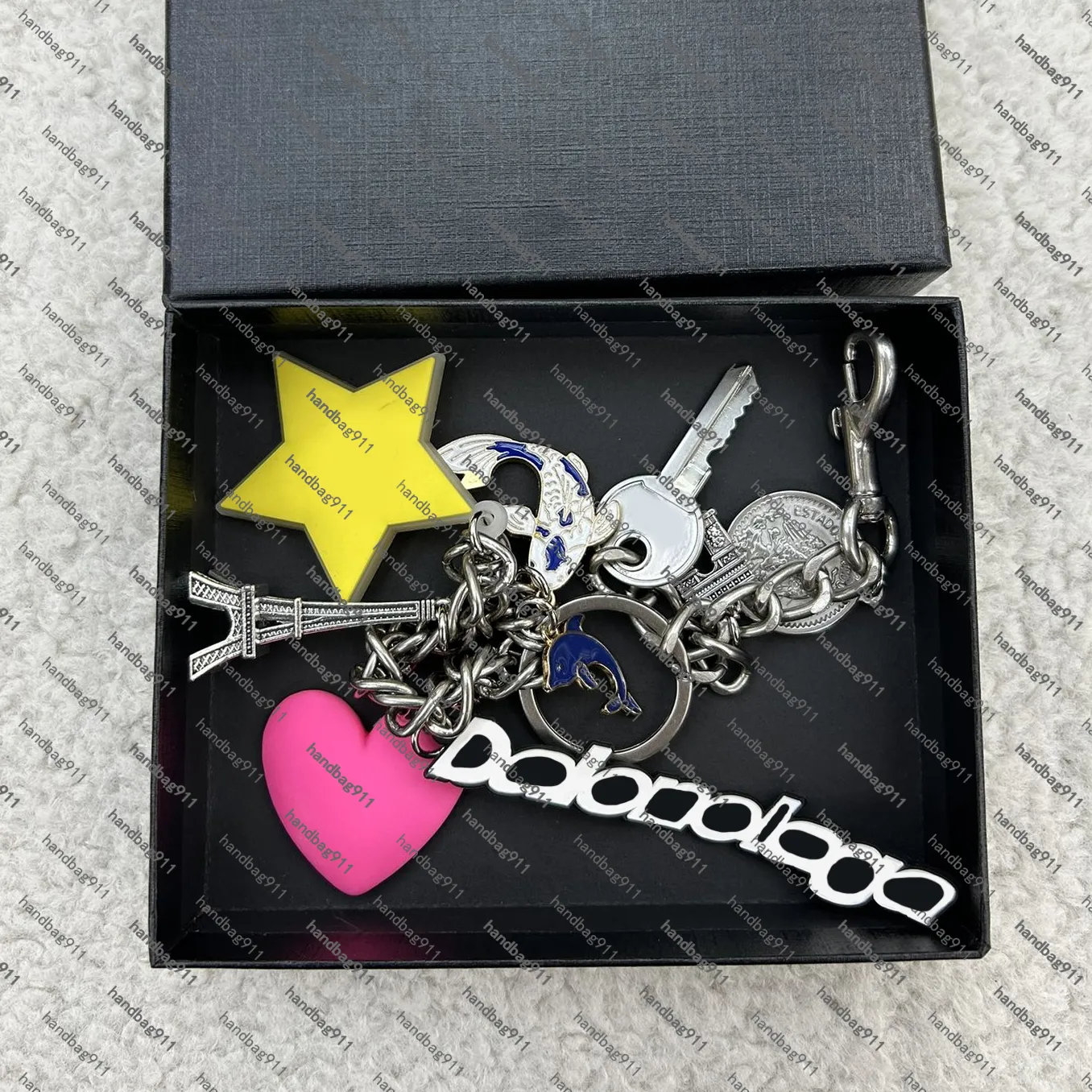 24SS New High Quality Metal Lock Chain Letter Rodeo Leather Keychain ...