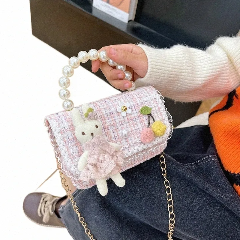 DHgate.com:2024Pearl Shoulder Bag for Kids, Plush Rabbit DHgate.com:2024Pearl Shoulder Bag for Kids, Plush Rabbit