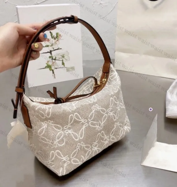 DHgate.com:Stylish Cubi Anagram Canvas Shoulder Bag with Designer ...