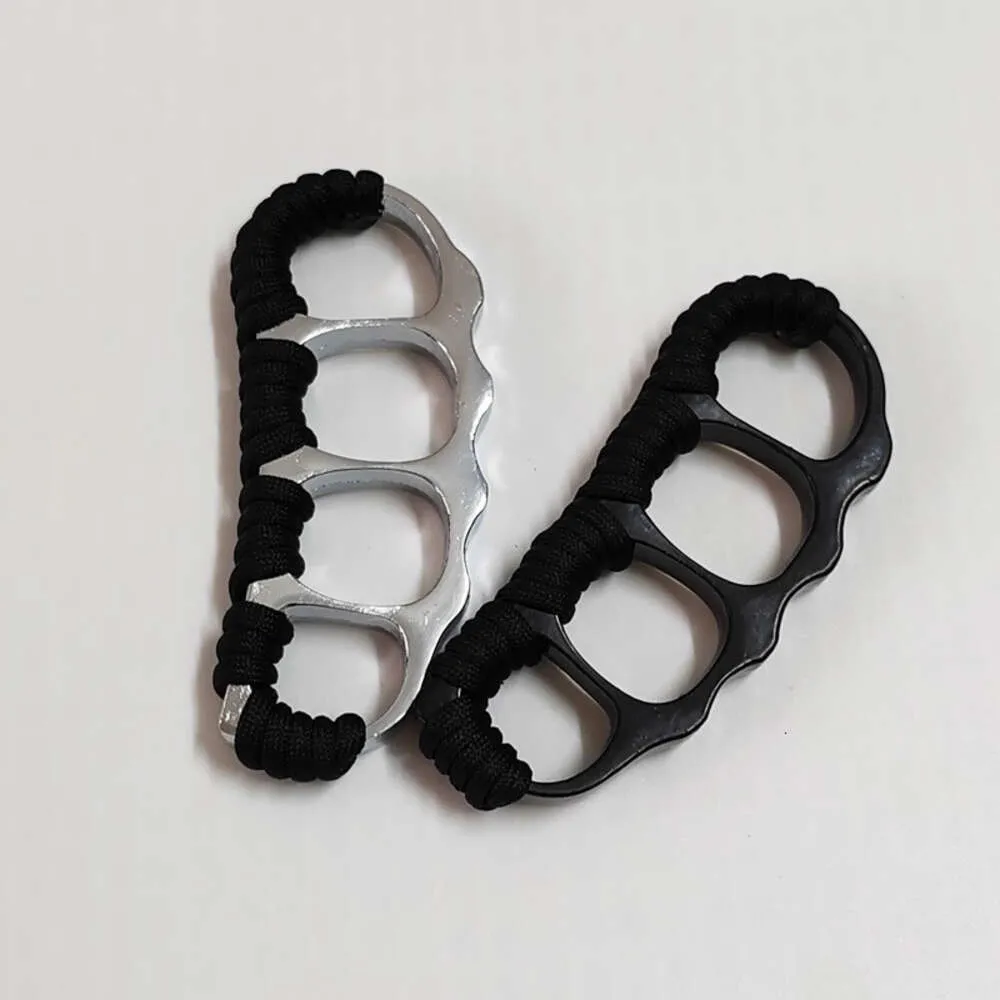 DHgate.com:Defensive Four-Finger Tiger Ring Survival Rope Prop with ...