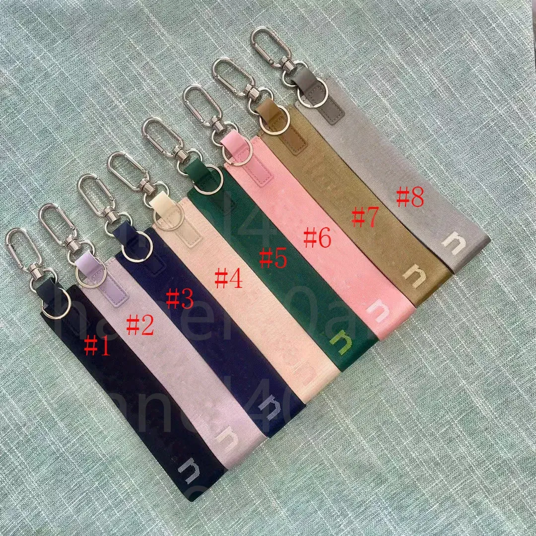 DHgate.com:8-Color Lu Yoga Keychain Bag, Wrist Chain Decoration with ...