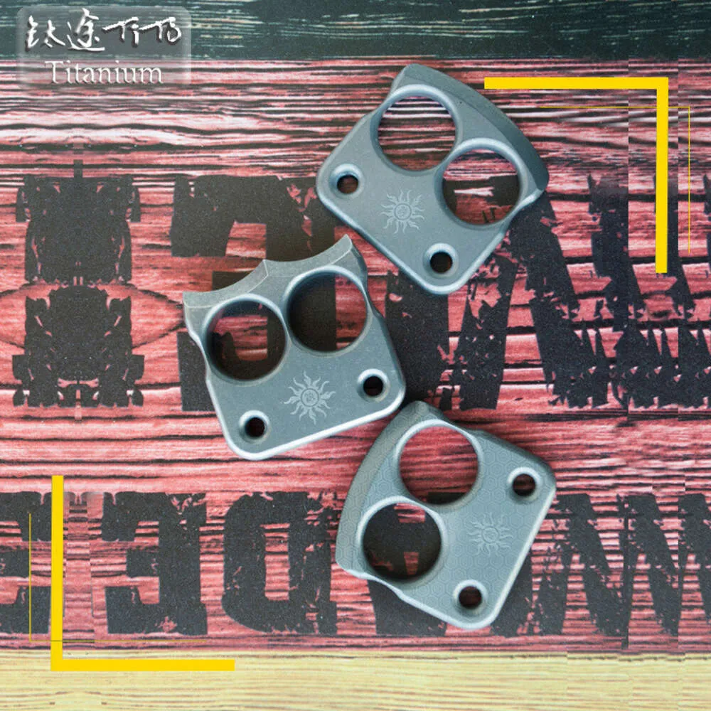 DHgate.com:Alloy Tito Titanium Finger Buckle Pendant For Self-Defense ...