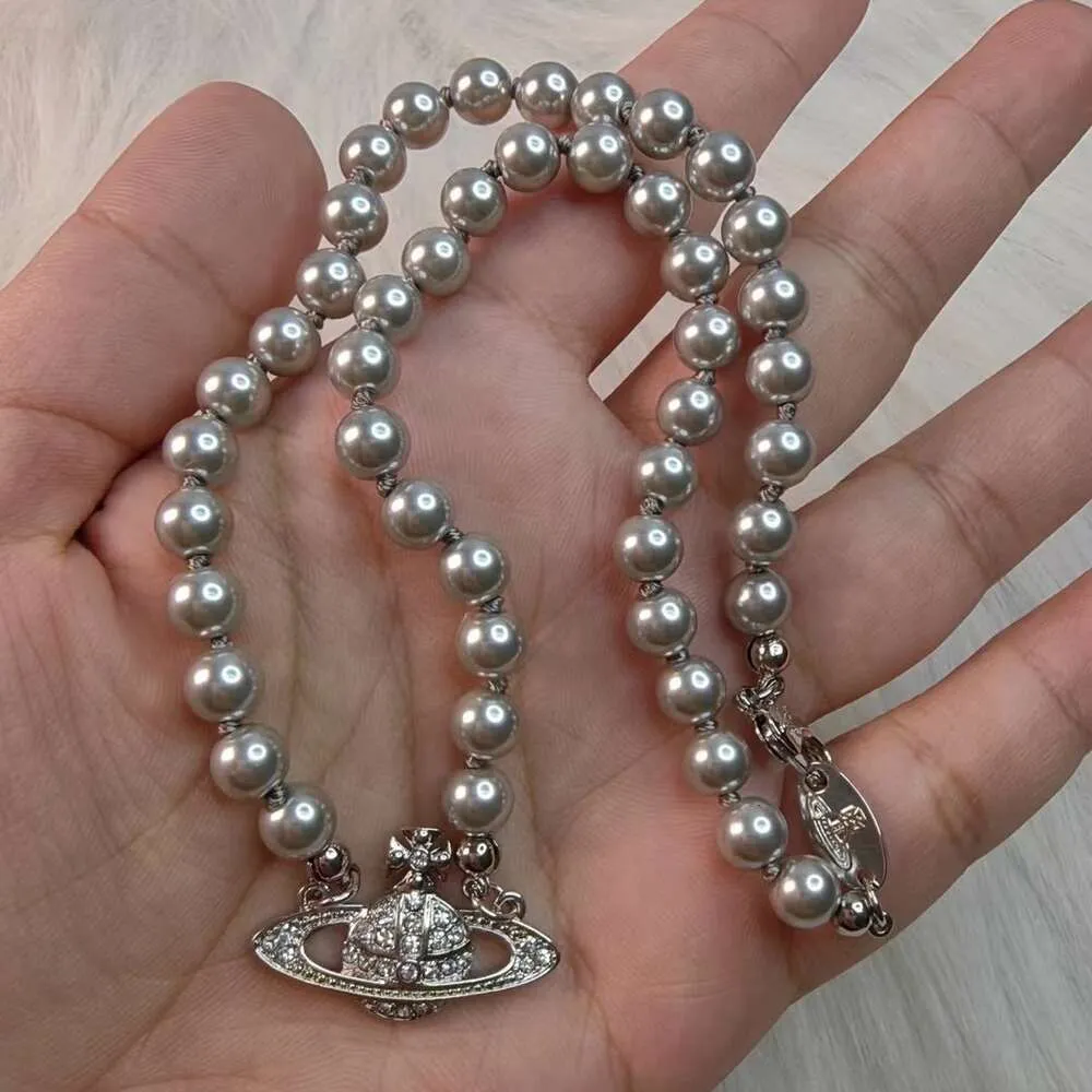 Vivvienne Westwood Saturn Pearl Necklace Classic Grey Pearl with Red Planet Chain