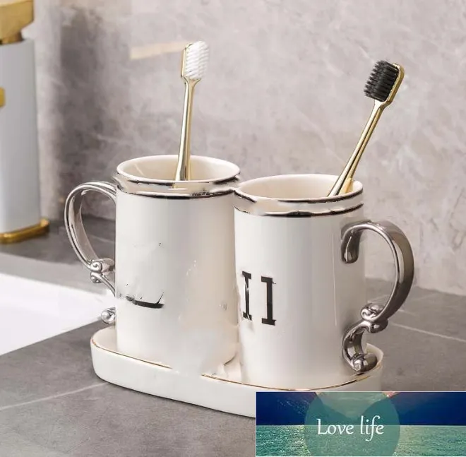 White ceramic tooth cup set with hasp closure for bathroom use from ...