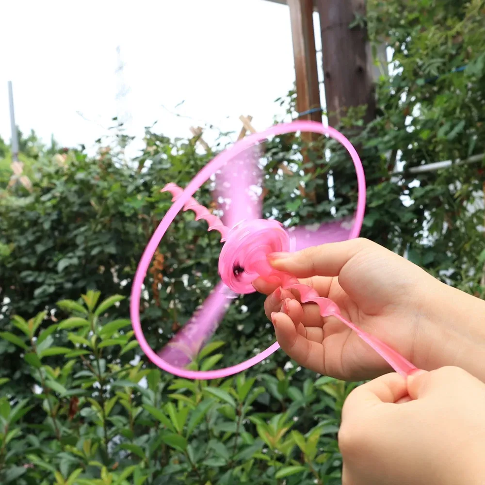 DHgate.com:10/1pcs Colorful Plastic Dragonfly Hand Push Flying Toys for ...