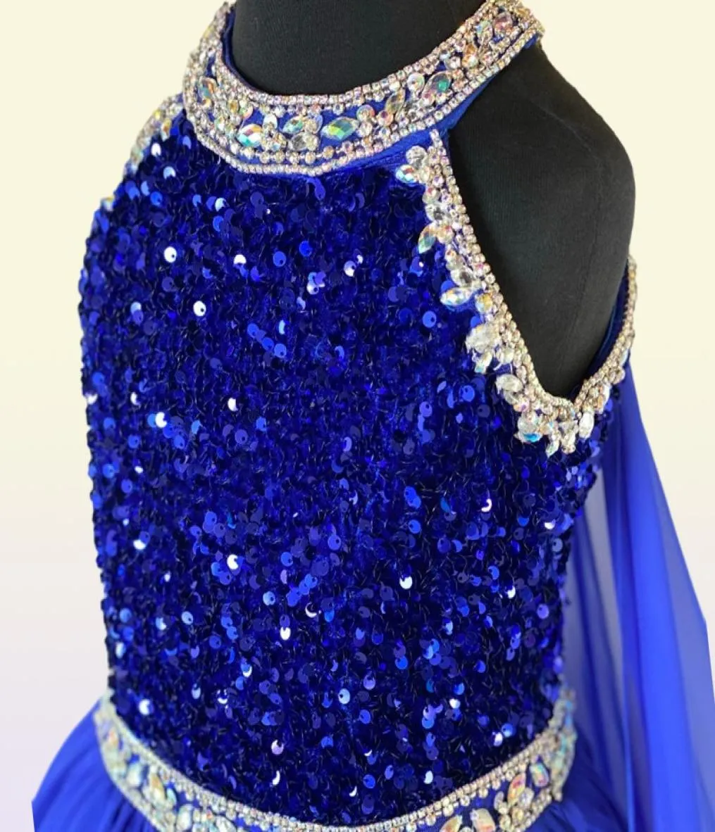 White Chiffon Ballgown With Blue Goldstone Crystal Embellishments And ...