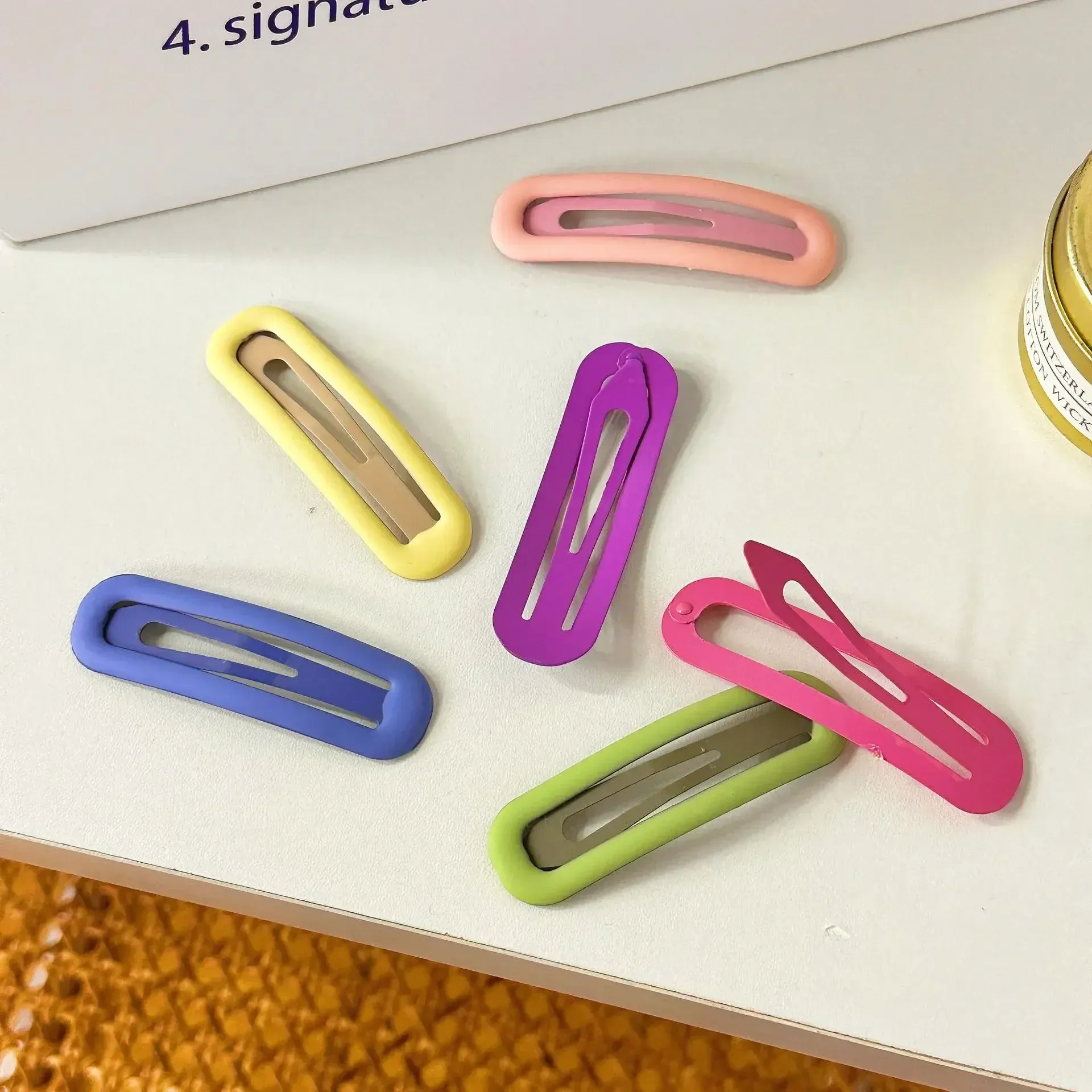 DHgate.com:Candy-Colored Oval Metal Hair Clips for Kids and Women (3 ...