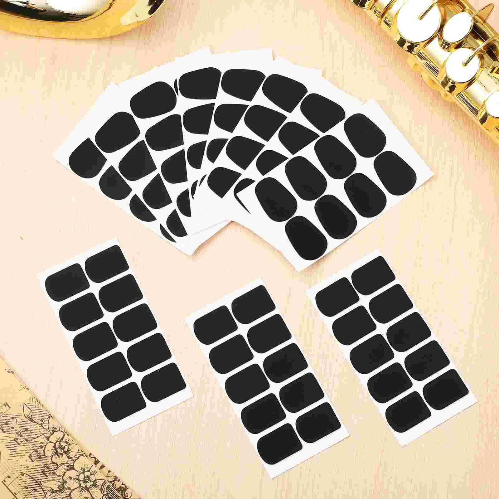 DHgate.com:94PCS Alto & Tenor Saxophone Adhesive Repair Pads Cushions ...
