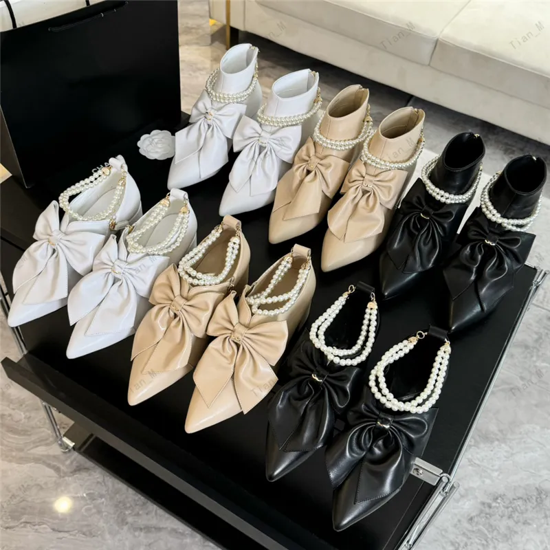 Designer Bootie: Elegant Pointy Toe Booties With Pearl Chain, Big Bow ...