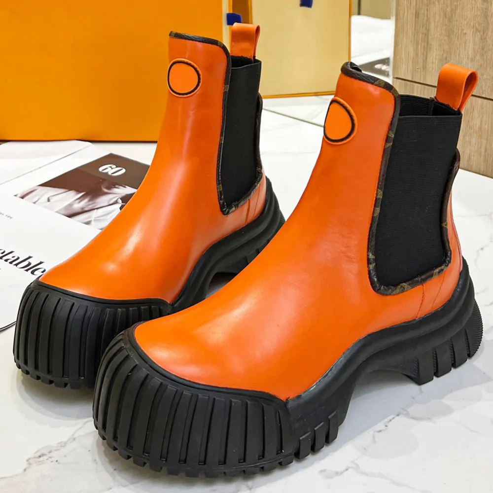 Classic Ruby Flat Ankle Boot With Rubber Sliders Outsole And Brand ...