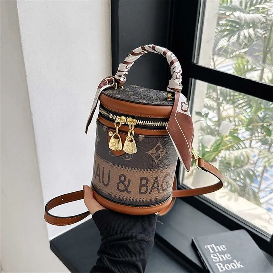 DHgate.com:Cylinder-Shaped Casual Versatile Handbag for Women in 2024 ...