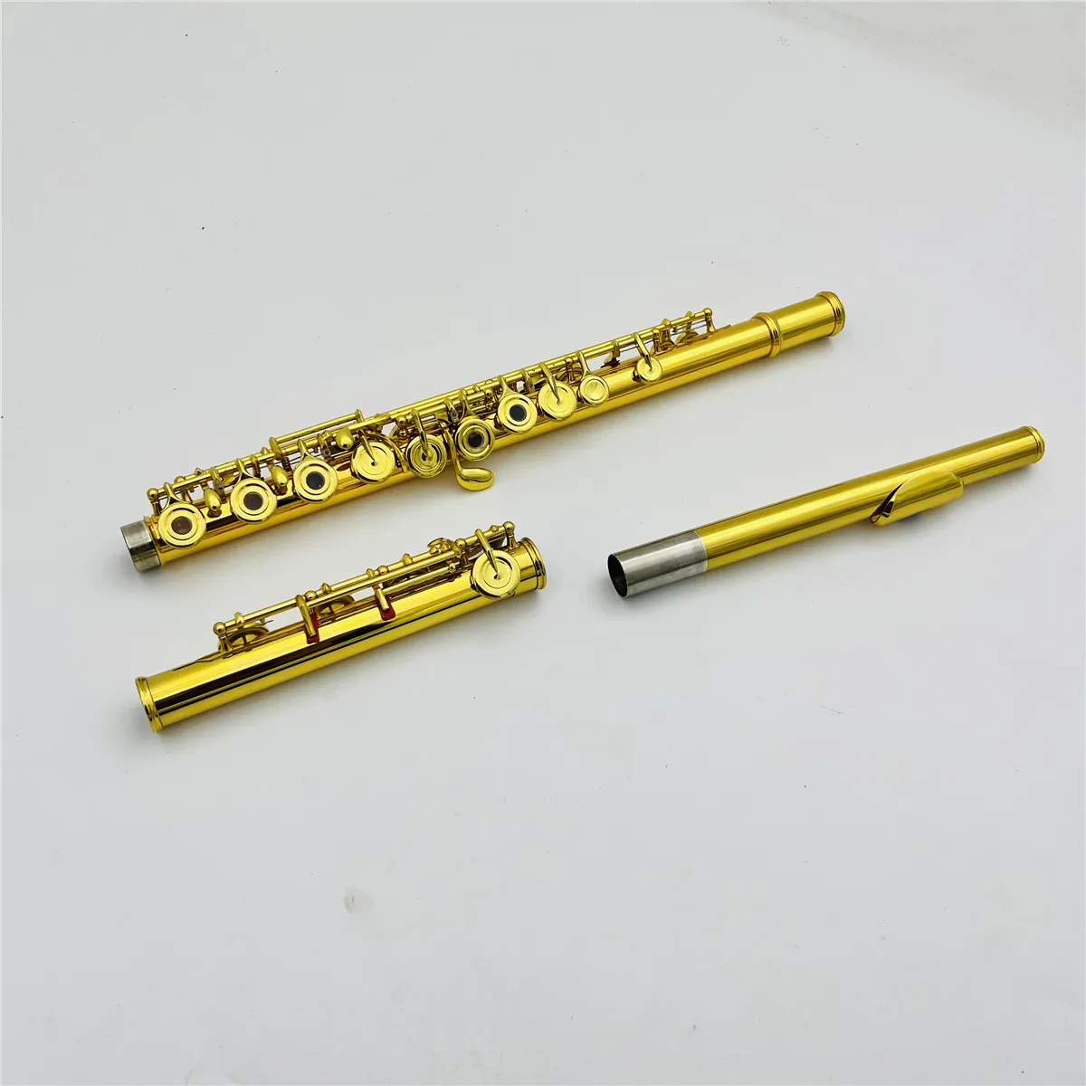 DHgate.com:Professional C Tune Flute 17 Keys Open Hole Gold Lacquer ...