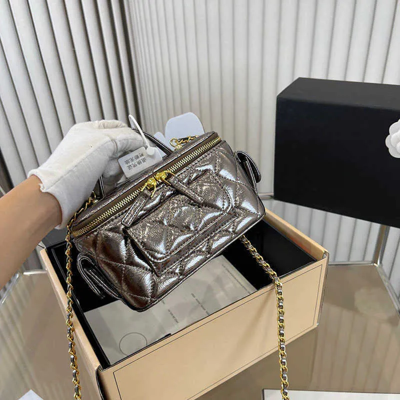 DHgate.com:Womens Quilted Leather Cosmetic Trunk Bag with Mirror, Card Holder, and Crossbody ...