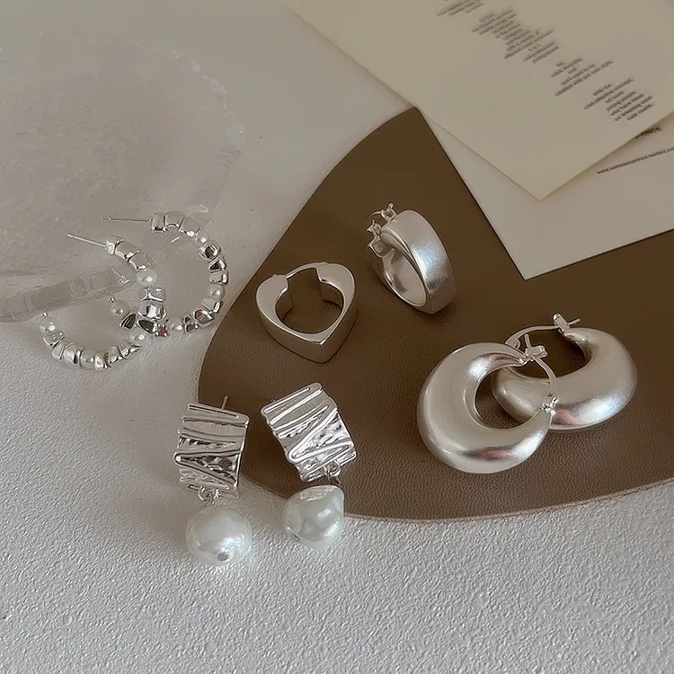 DHgate.com:Designer Silver Matte Metal Earring For Women Simple Big ...