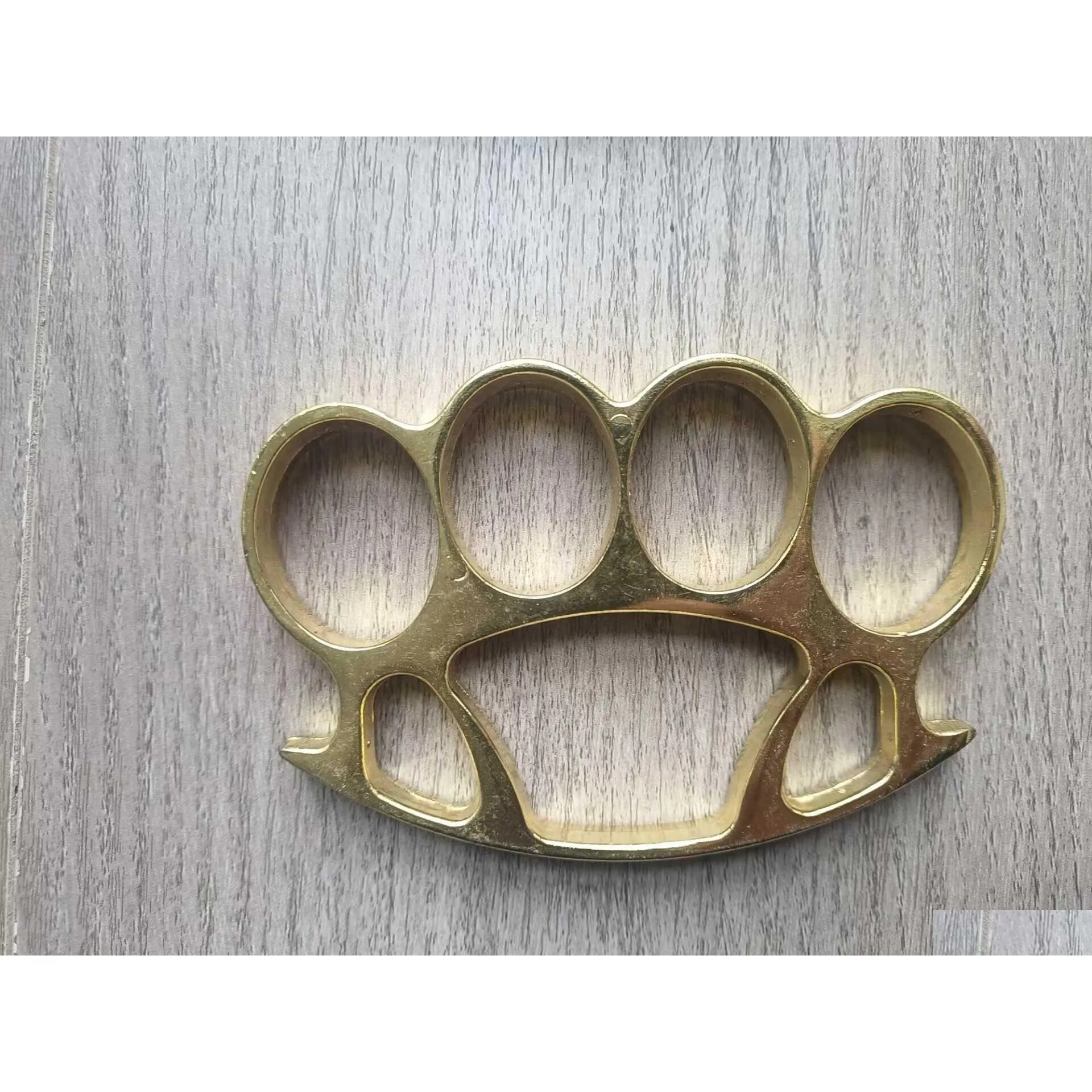 DHgate.com:Finger Four Self Legal Defense Buckle Tiger Hand Brace Fist ...