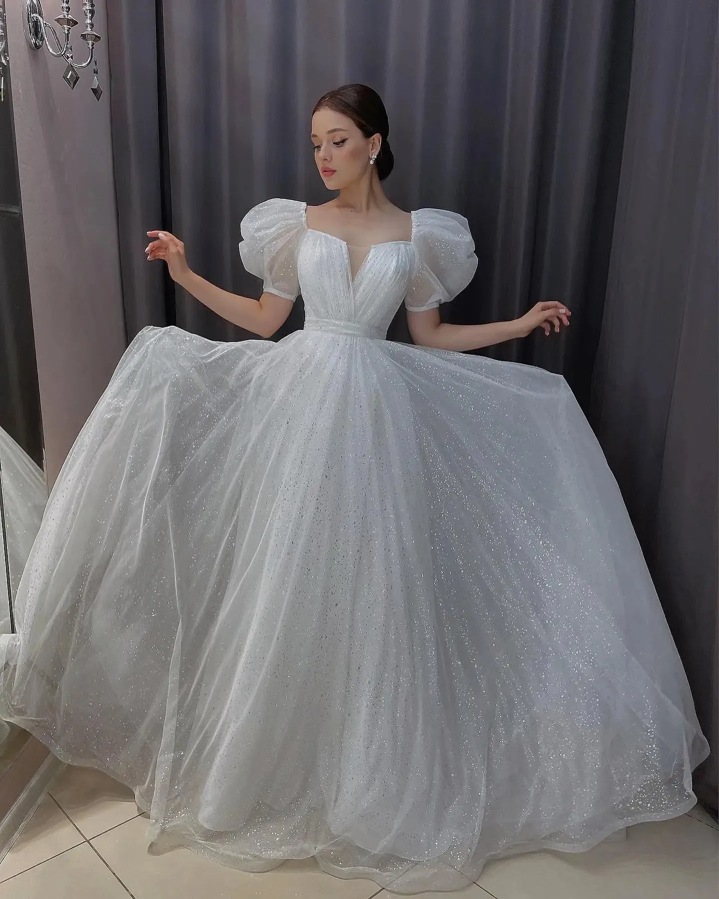 Glittery Tulle A Line Wedding Dress With Puffy Sleeves And Glittery Tulle A Line Wedding Dress With Puffy Sleeves And