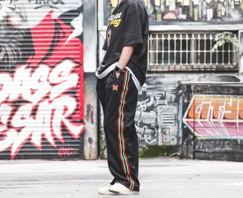 AWGE Mens Hip Hop Pants With Butterfly Embroidery And Japan AWGE Mens Hip Hop Pants With Butterfly Embroidery And Japan