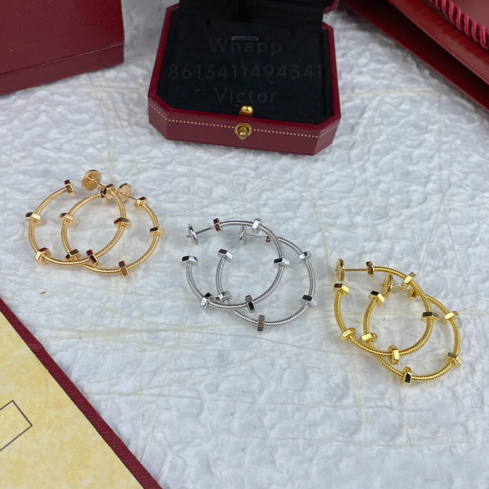 DHgate.com:Screw Clou Stud Earrings: 18K Gold Plated, Highest Counter ...