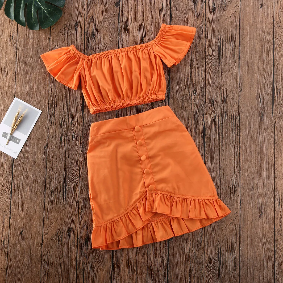 orange frilly set