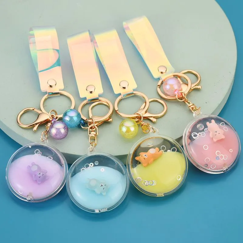 Cute Jelly Disc Liquid Transparent Keychain With Doll Bear Oil Design ...