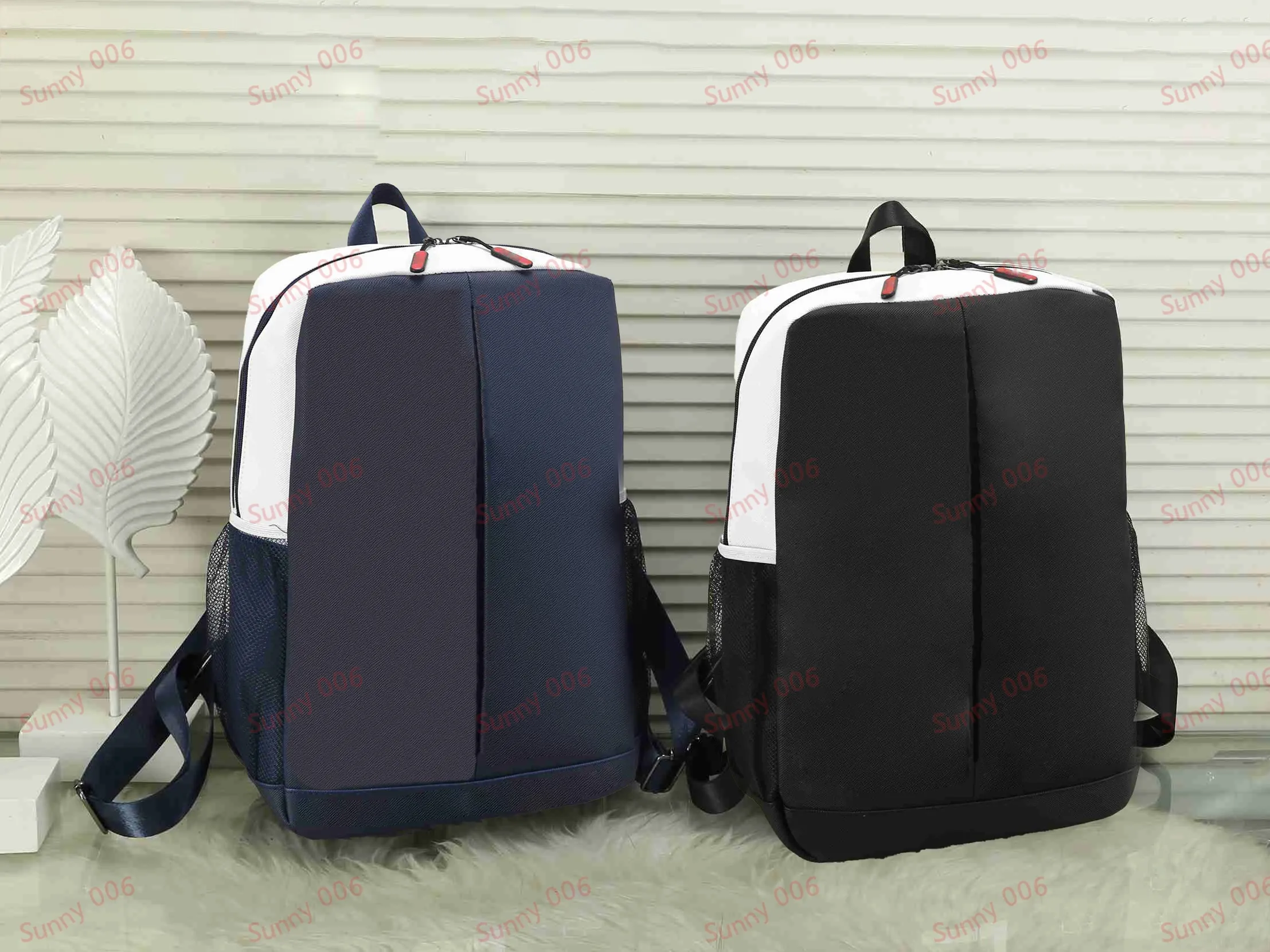 DHgate.com:Designer Colorblock Backpack with Letter Luggage Compartment ...
