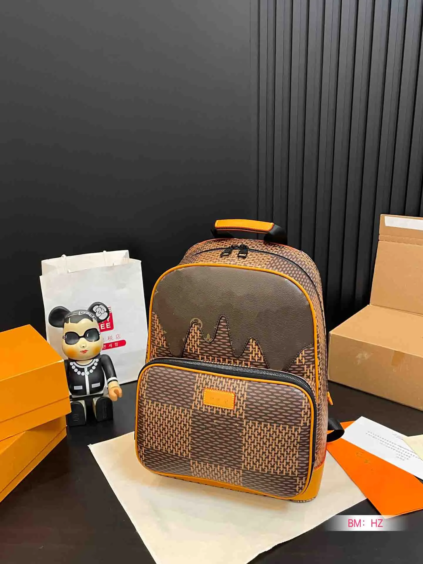 DHgate.com:2024 Designer Backpack Men's and Women's Luggage Travel Book ...