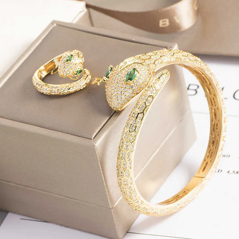 DHgate.com:Fashion Accessories Python Ring Bracelet Set with Green Eyes ...