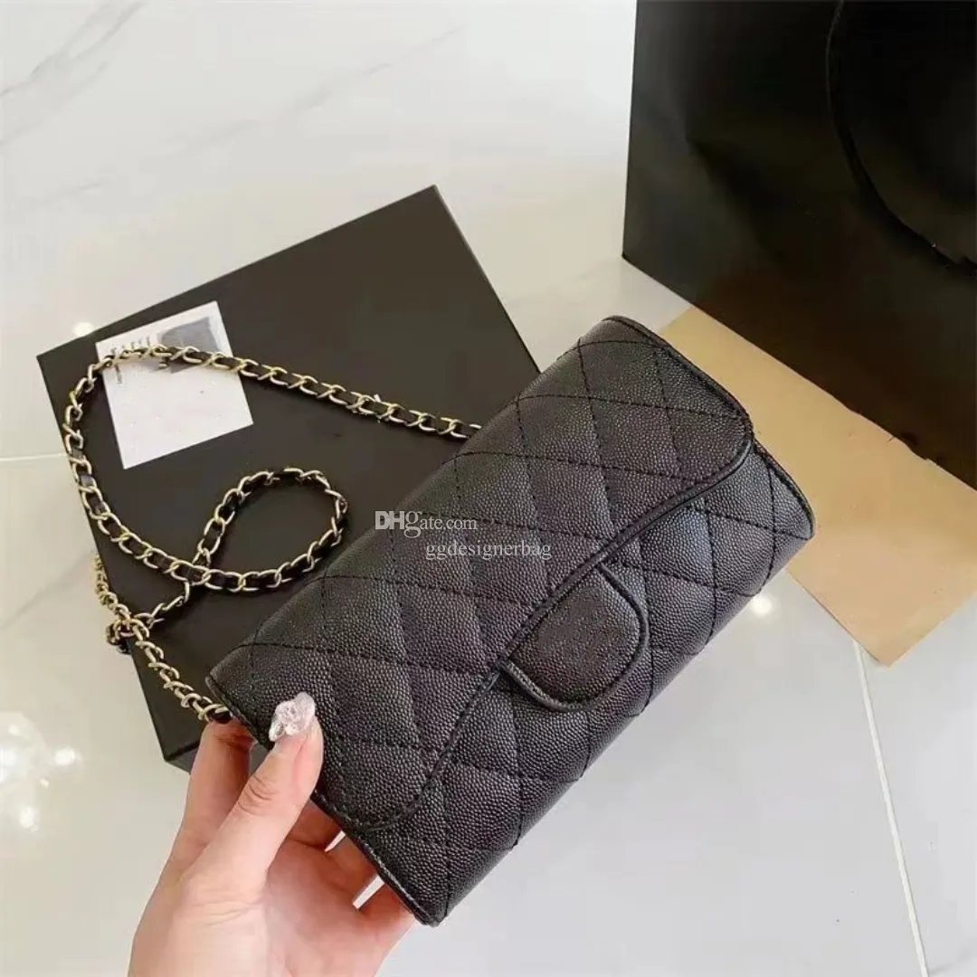 Gold Crossbody Bags: Miniature Caviar Leather Clutch... From ...