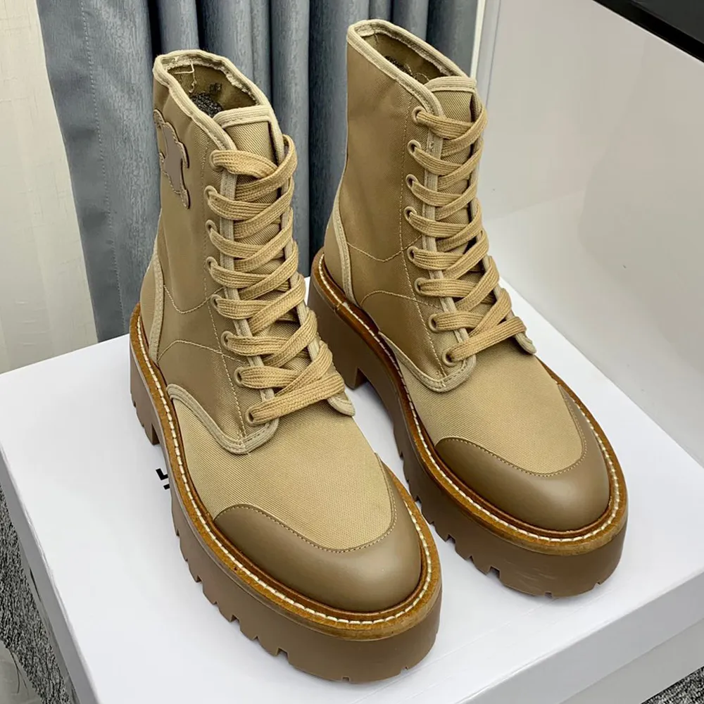 BOTTE LARGE À LACETS EN NYLON ET TAUREAU NOIR BRILLANT Bottes Triomphe ...