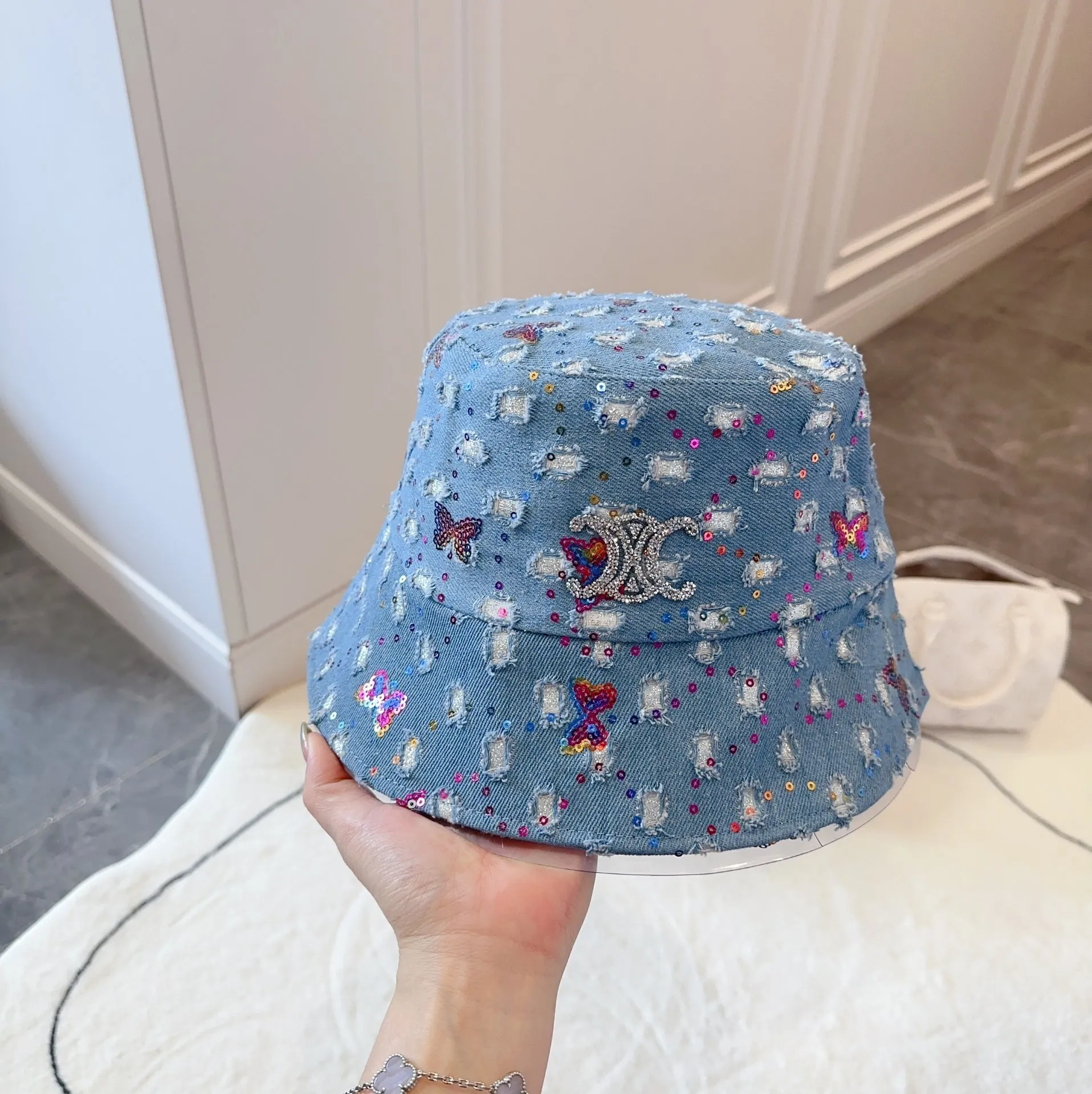 Designer bucket hat for men and women with adjustable fit and sun ...